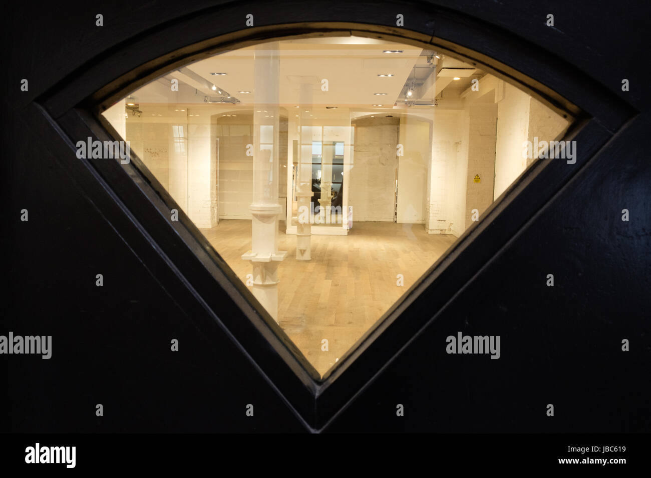 Fan shaped window, looking into deserted shop interior, Neal Street ...