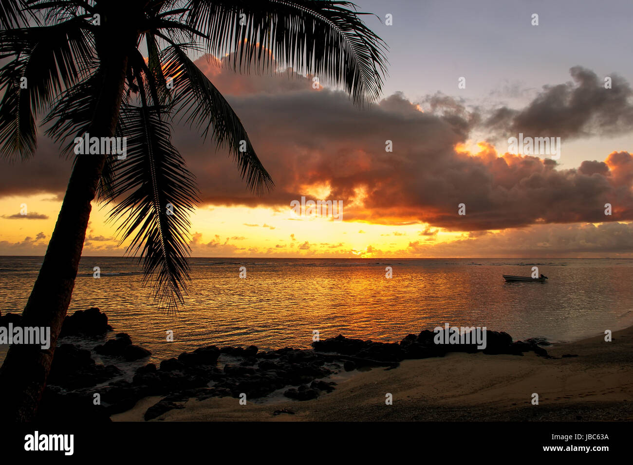 Colorful sunrise on the beach in Lavena village on Taveuni Island, Fiji ...