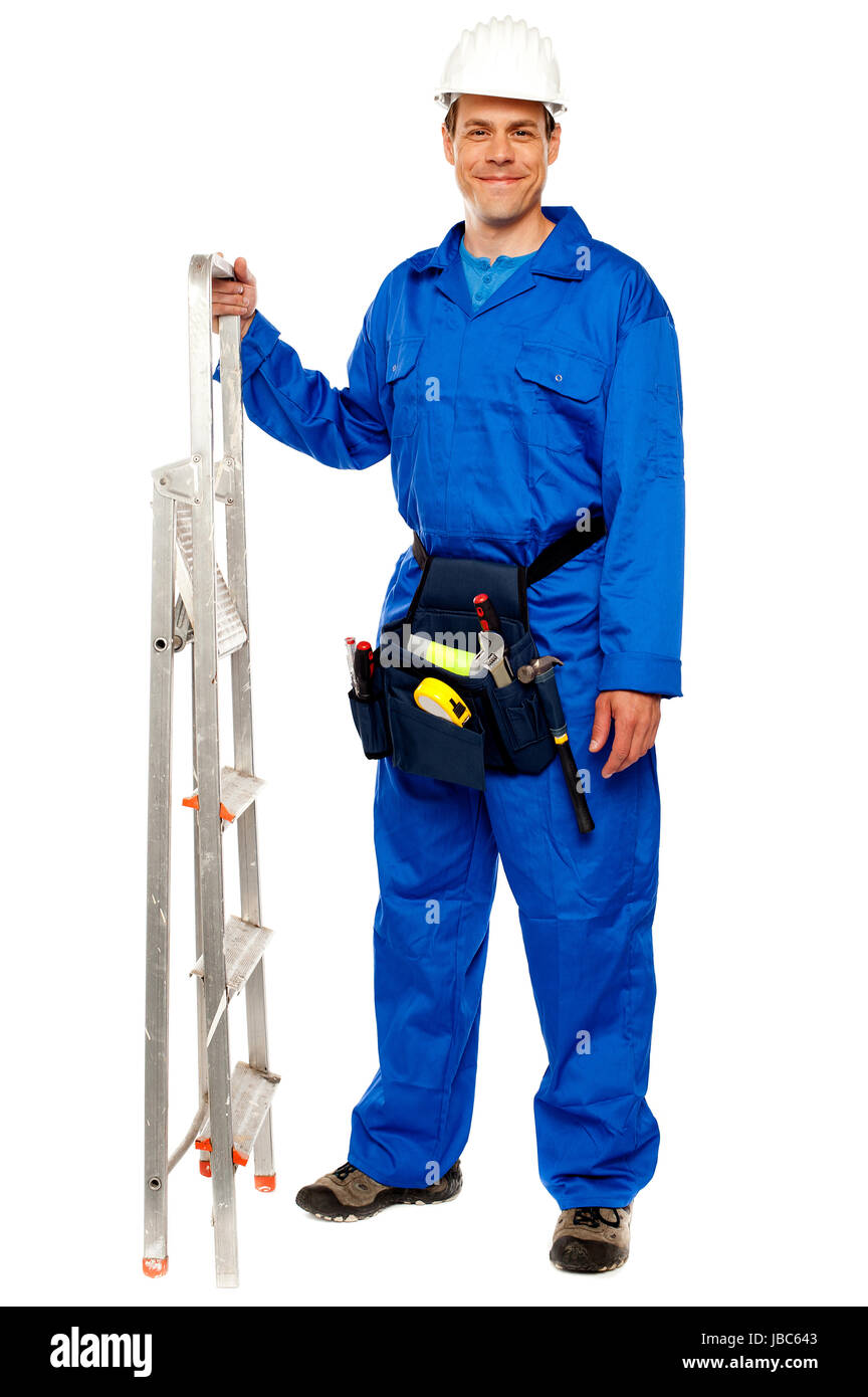 Repairman with a stepladder and tools bag standing against white ...
