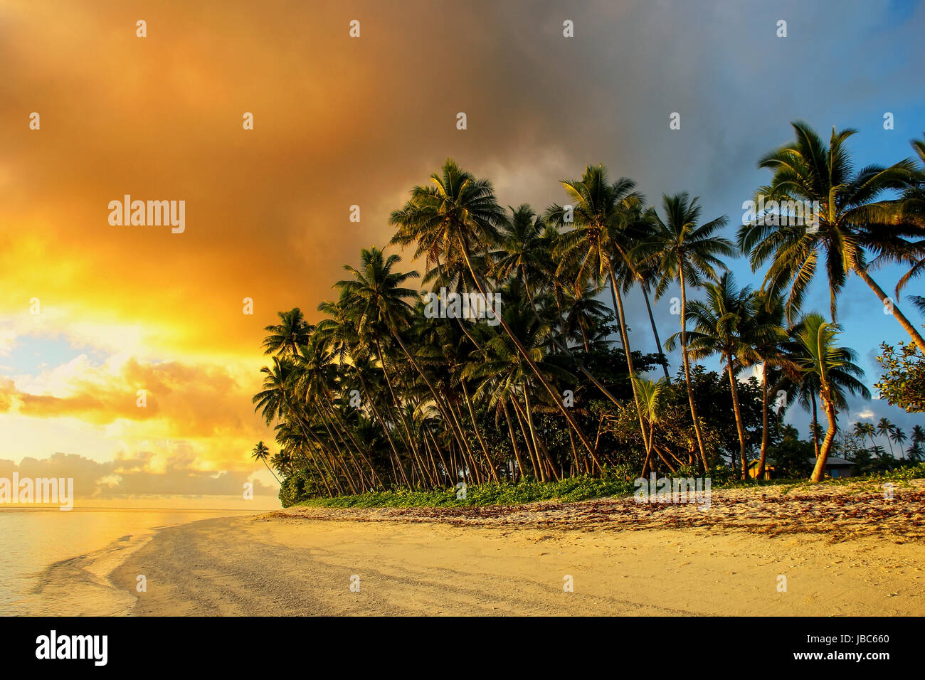 Colorful sunrise on the beach in Lavena village on Taveuni Island, Fiji ...
