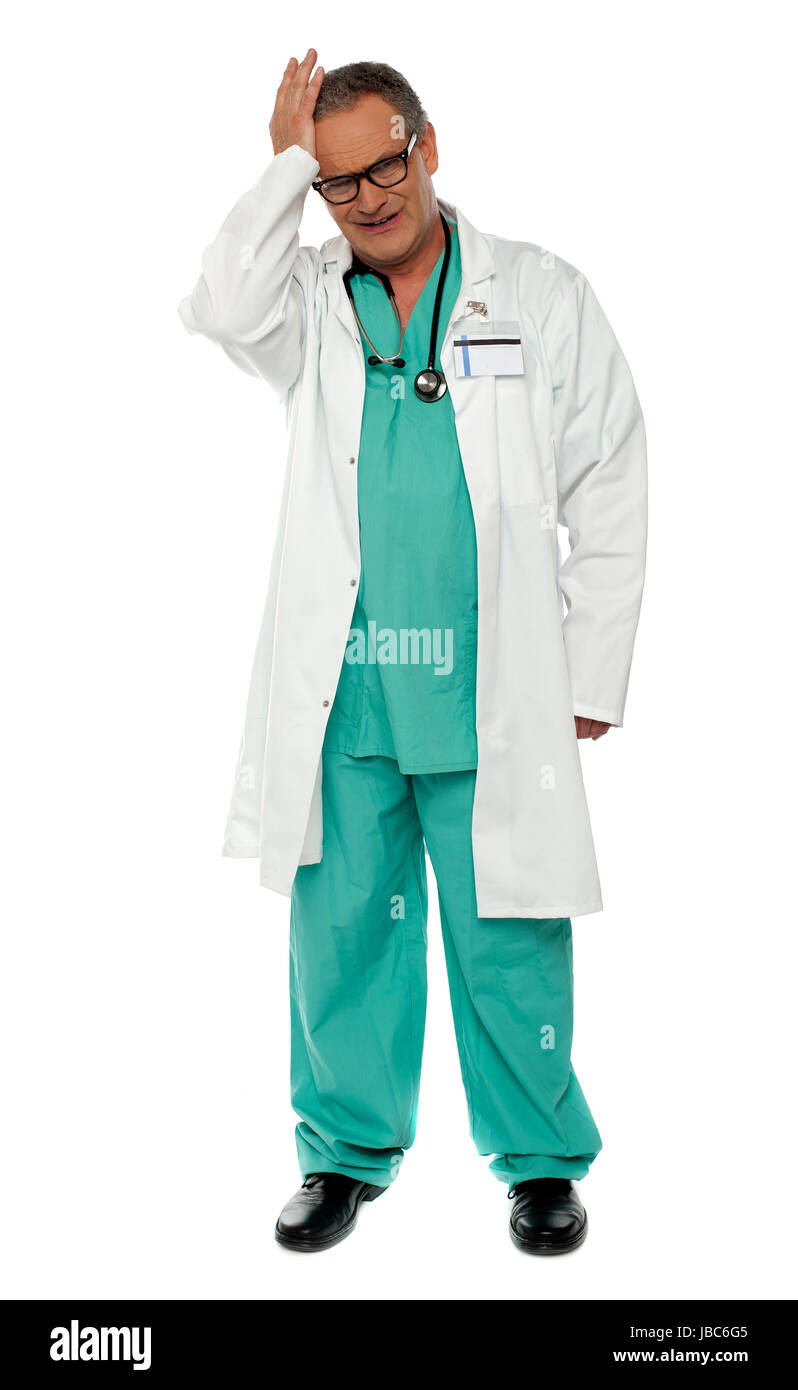 Full length shot of unhappy doctor in uniform isolated over white ...