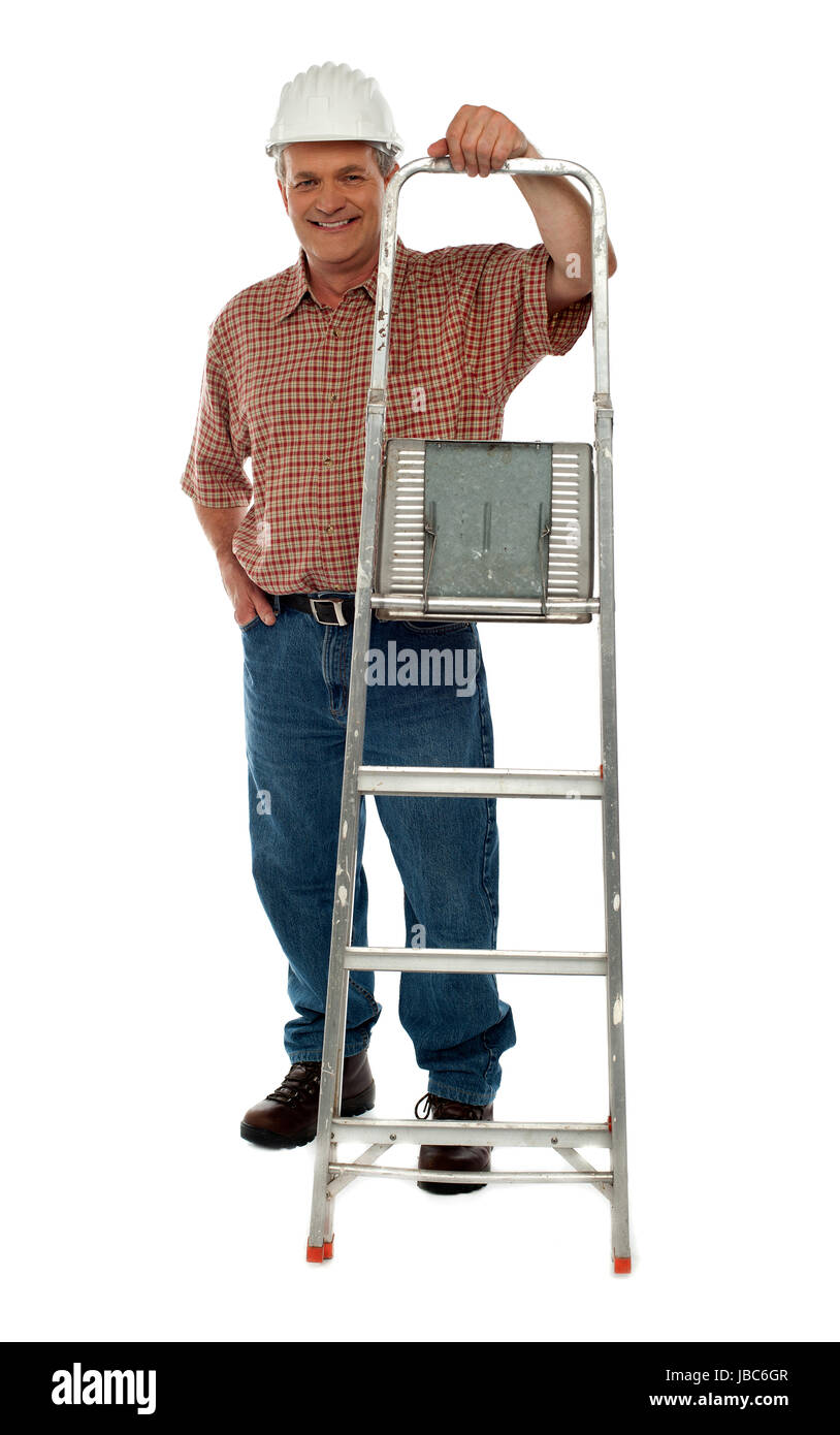 Full length portrait of smiling construction worker holding ladder ...