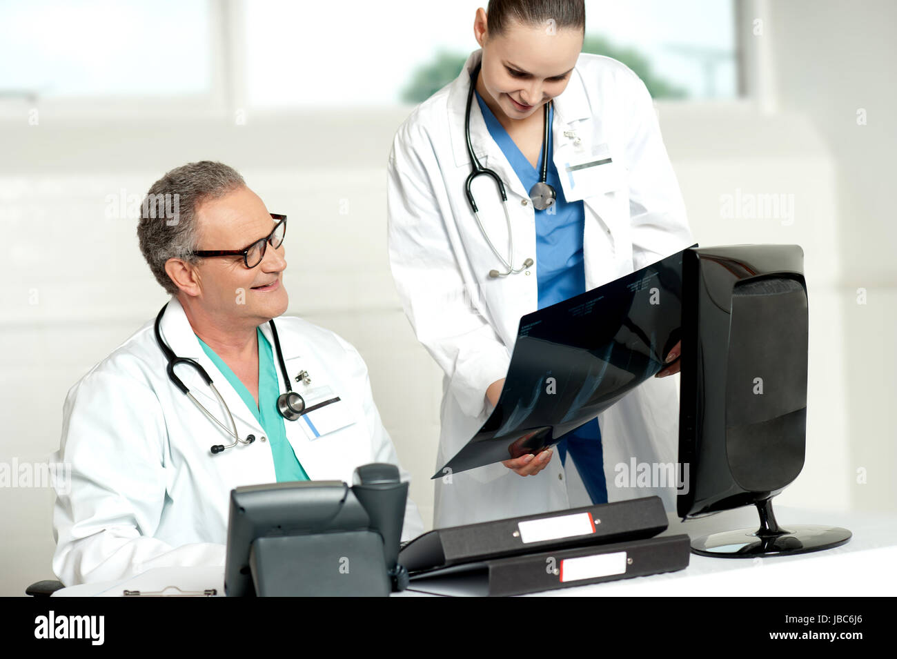 Doctors reviewing patient files hi-res stock photography and images - Alamy