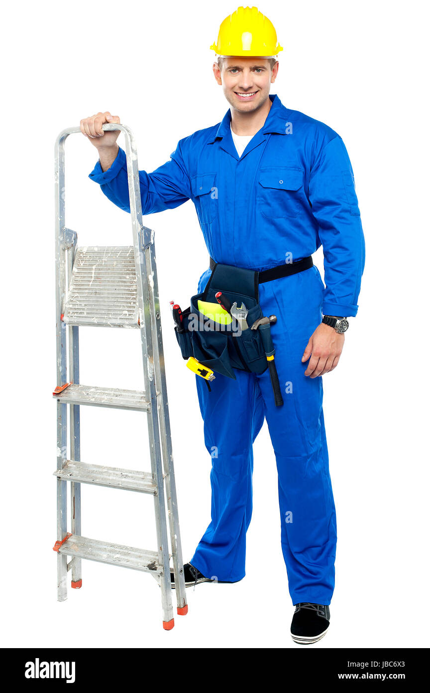 Young construction worker ready to get to work with stepladder isolated ...