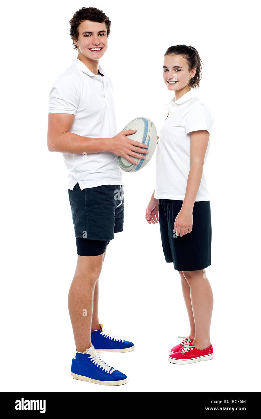 We are a great soccer team together. Boy holding ball tightly Stock ...