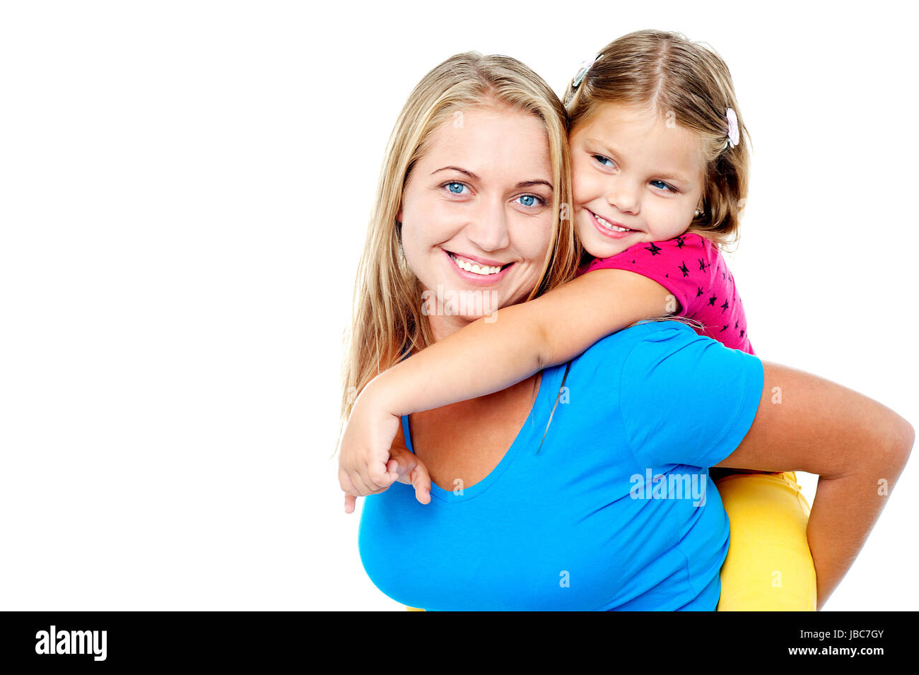 Mom and daughter having fun. Its piggy ride time Stock Photo - Alamy