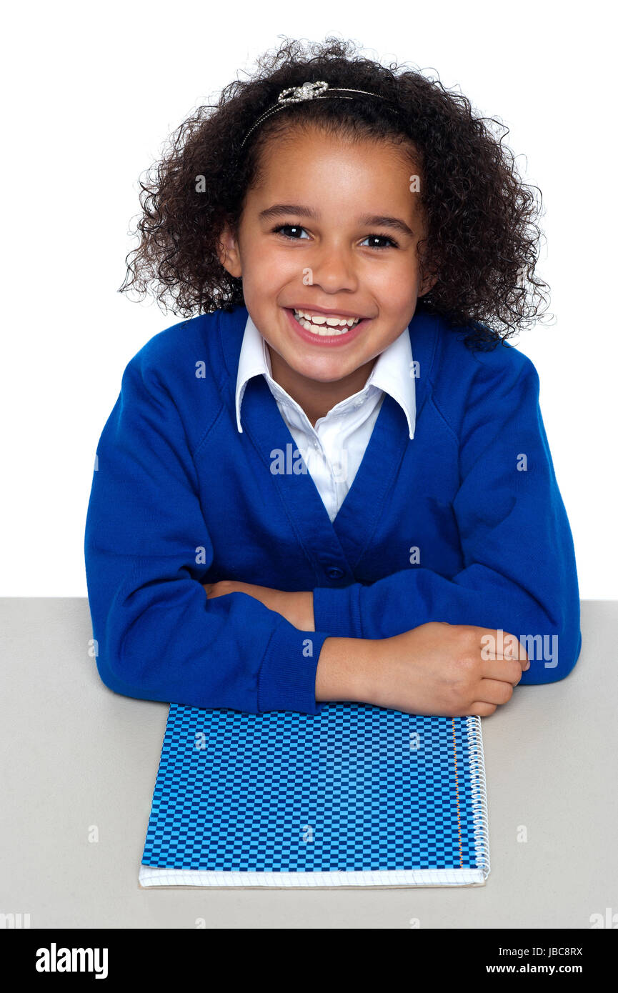 Cheerful African American relaxed student facing camera and smiling ...