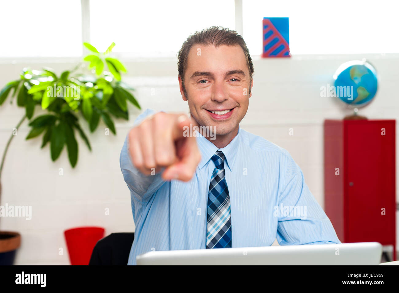 You, yes you! Great job done. Manager seated at his workstation ...