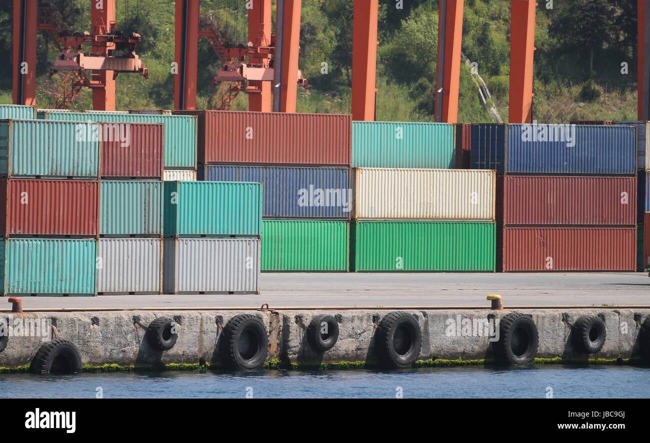 Containers waiting to transfer in a port Stock Photo - Alamy
