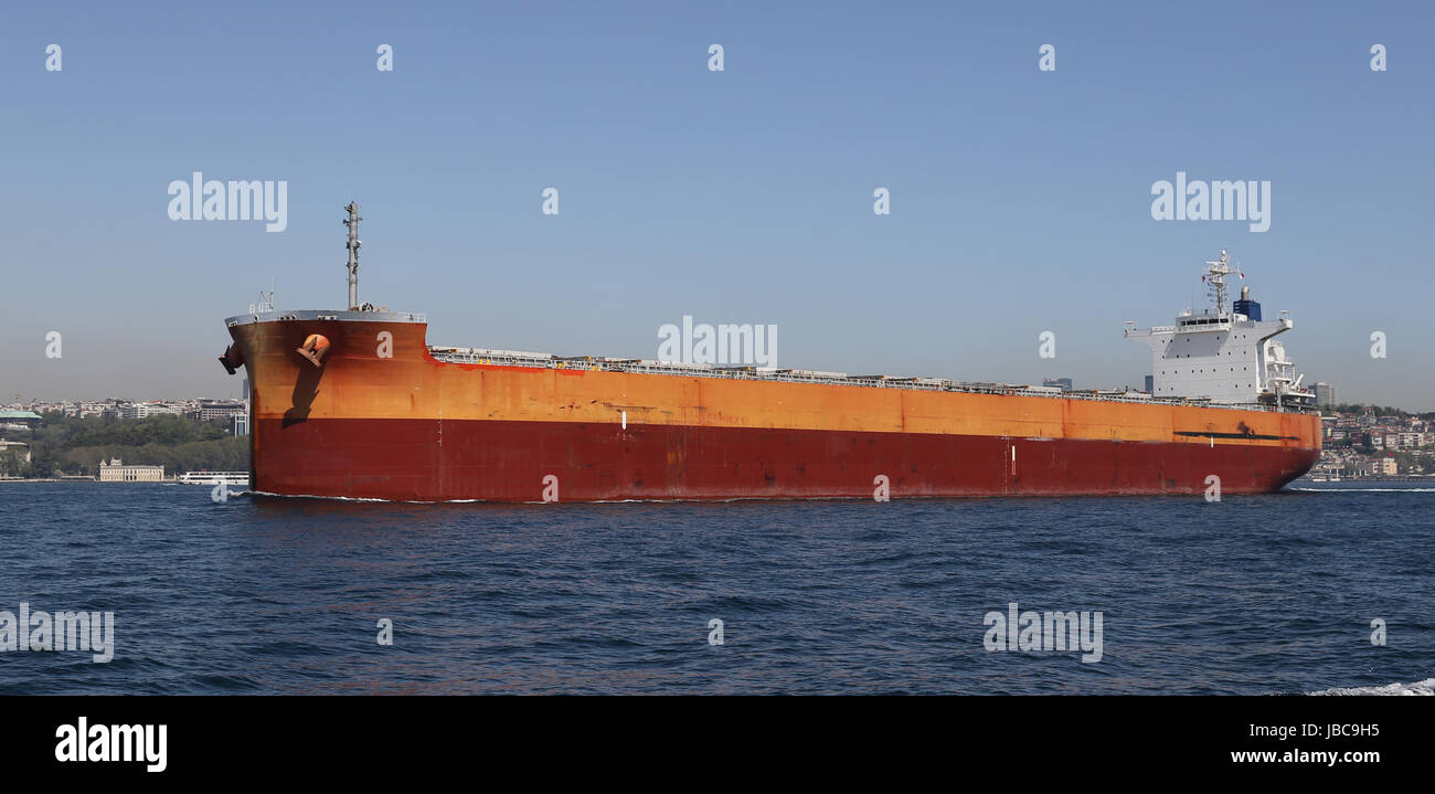 A cargo ship carrying goods between ports Stock Photo - Alamy