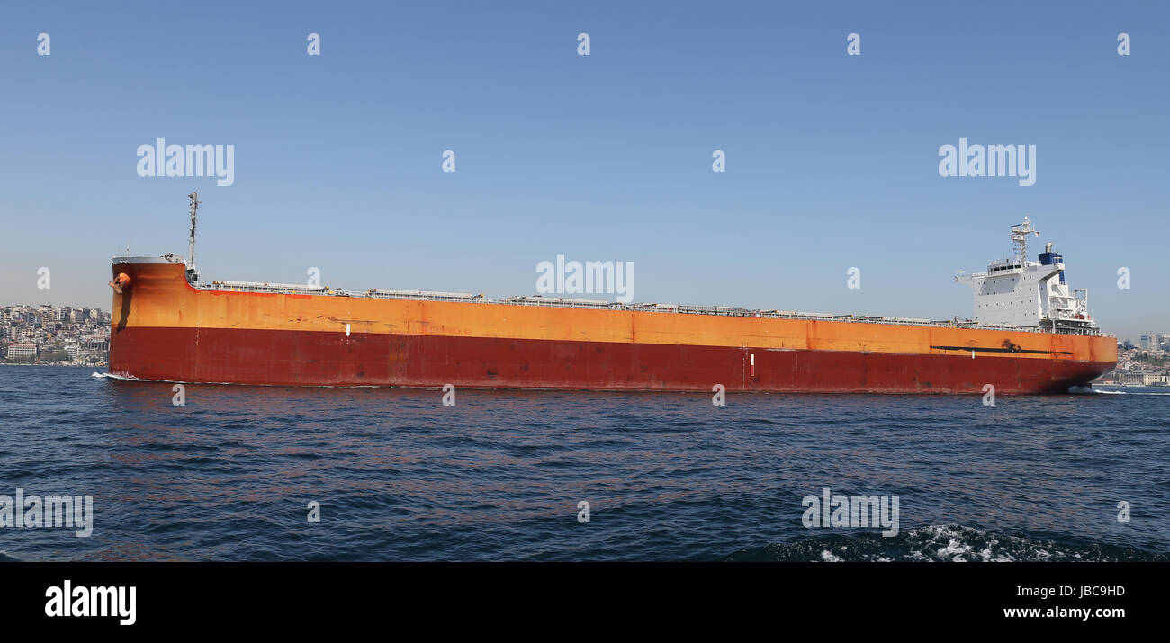 A cargo ship carrying goods between ports Stock Photo - Alamy