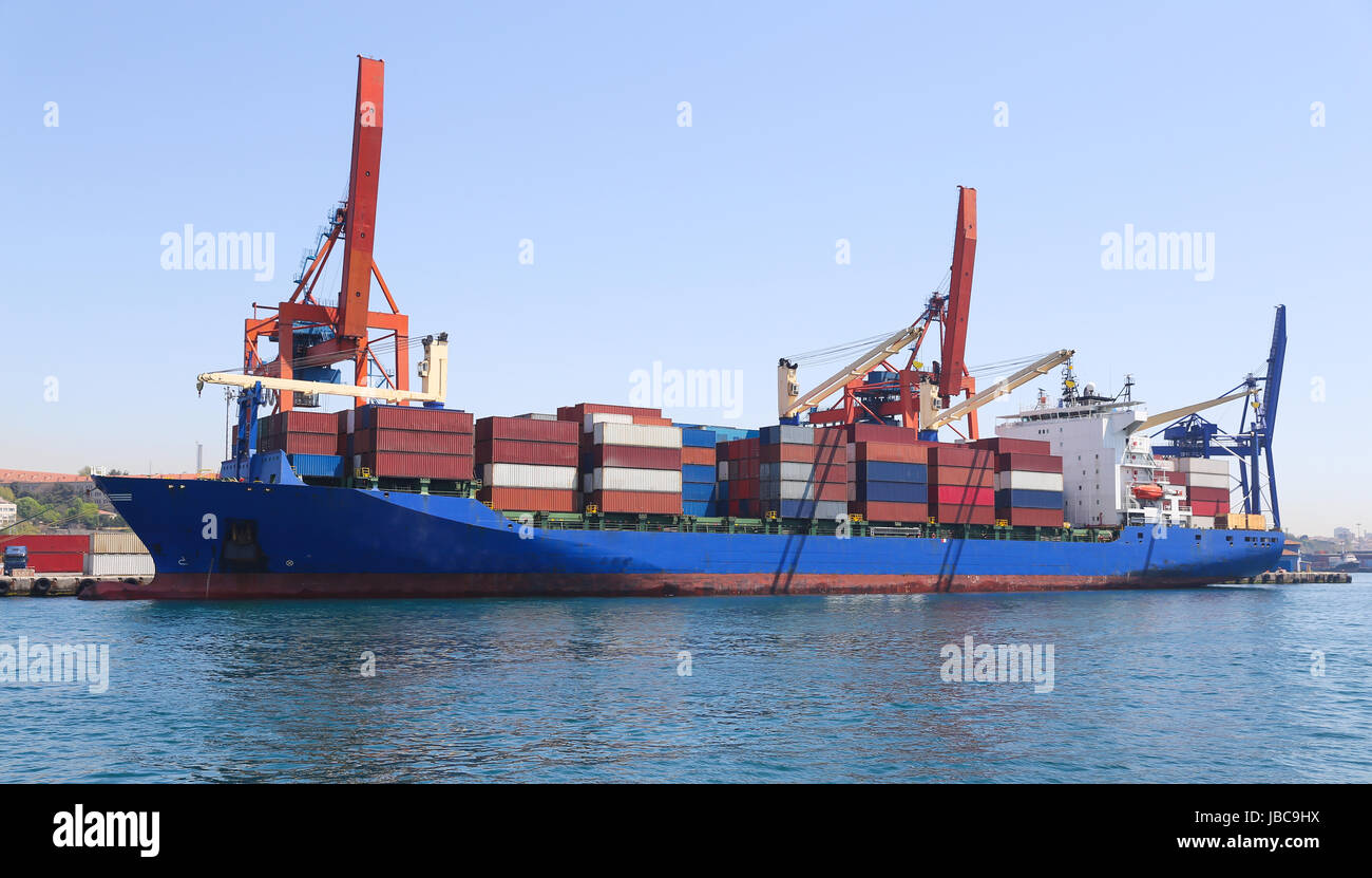 Container Ship is loading in a port Stock Photo - Alamy