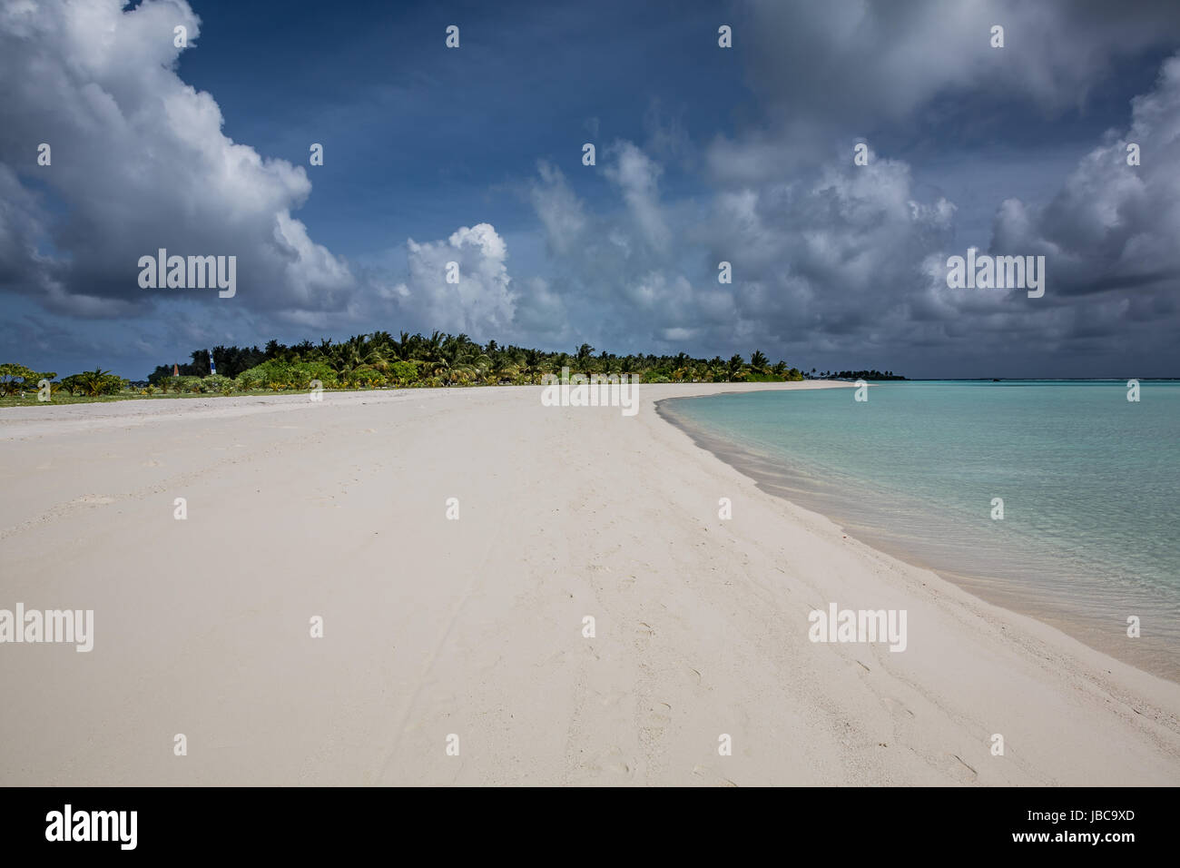 Peaceful beach in the Maldives in the Indian Ocean, Lush green ...