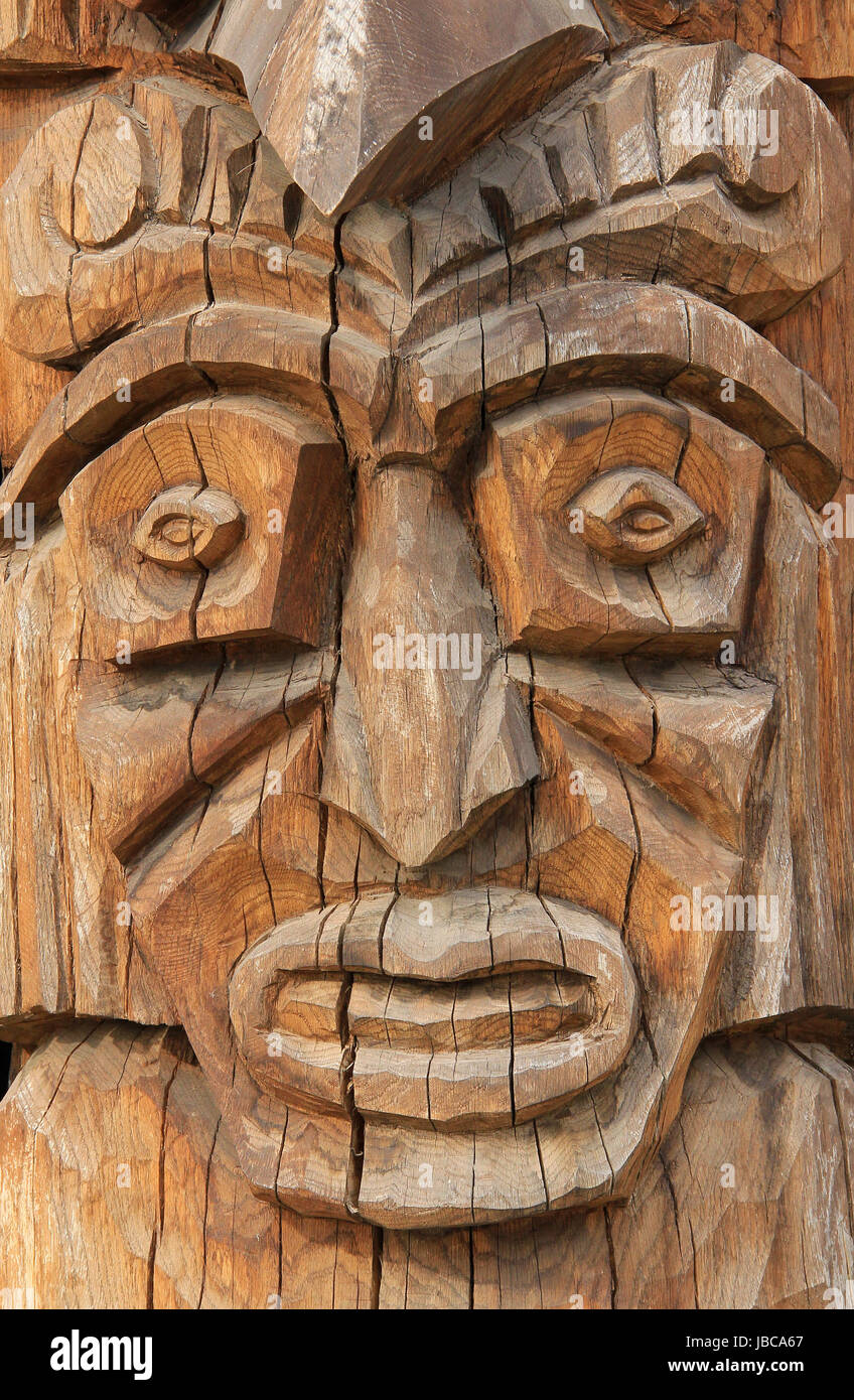 Wooden carved African ritual near the statue face Stock Photo - Alamy