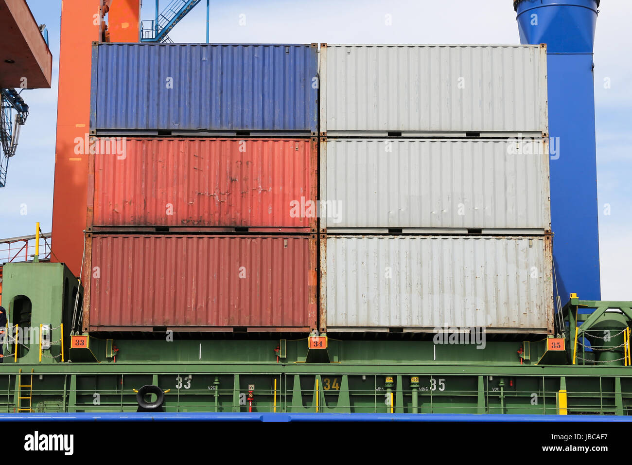 Container Ship is loading in a port Stock Photo - Alamy