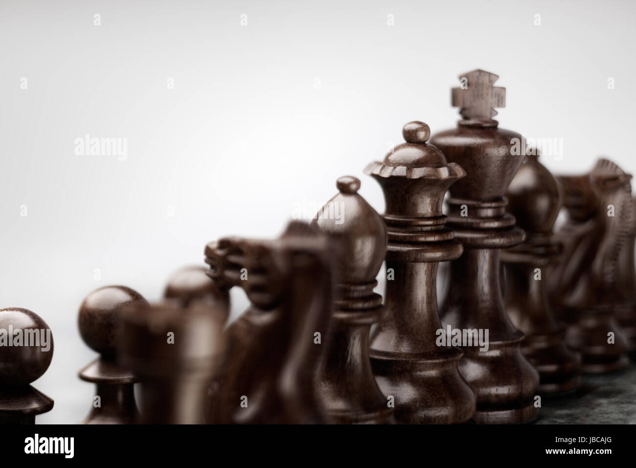 Fearless chess set standing in a row before battle ready to fight as a ...