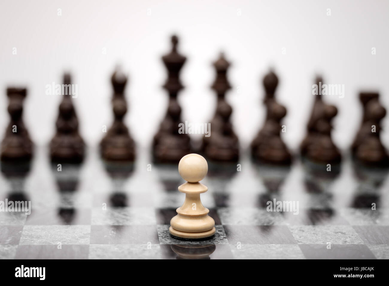 A pawn on the chequer before the shapes Stock Photo - Alamy