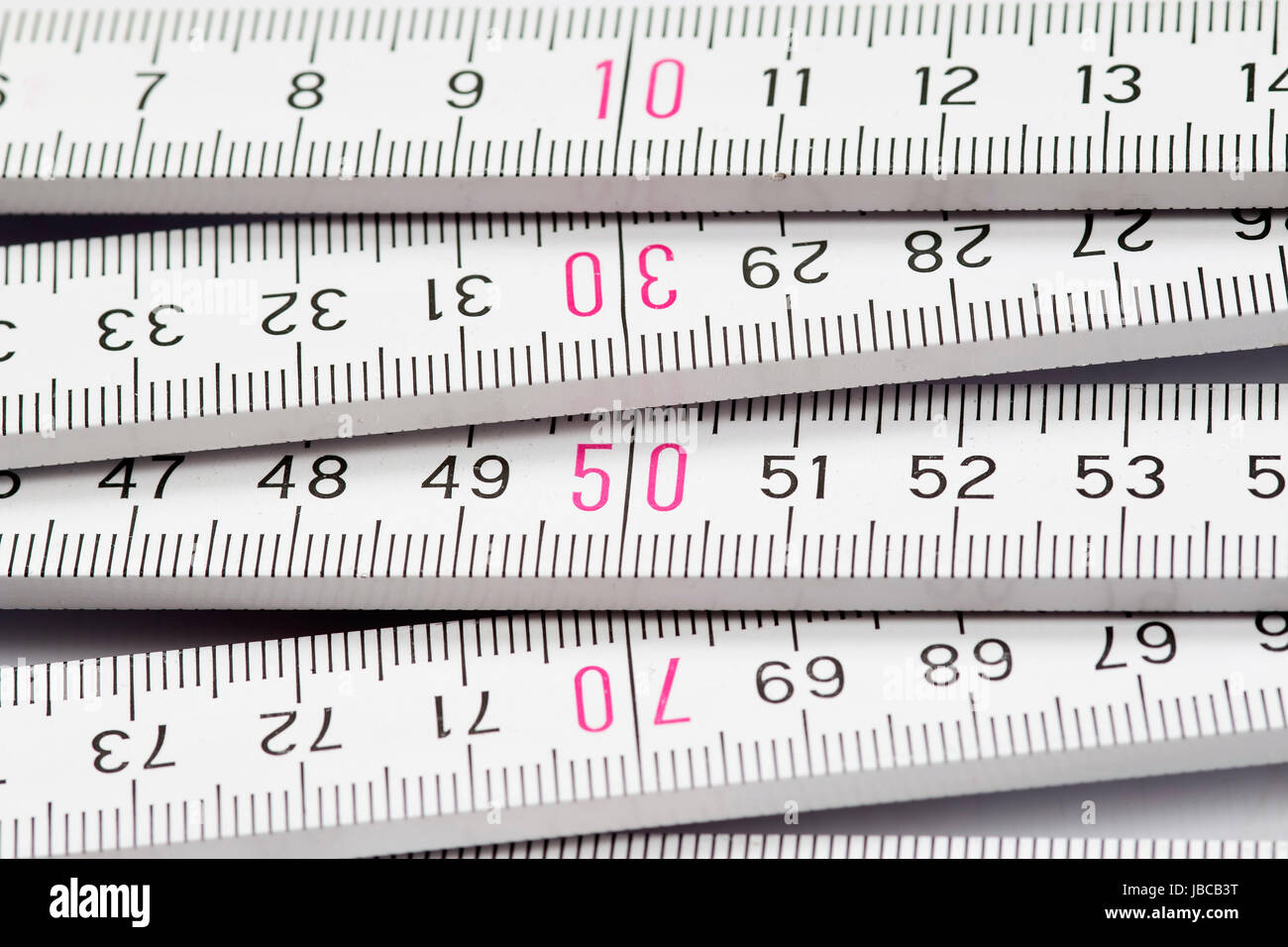 Detail of the folding meter rule - measure twice, cut once Stock Photo ...
