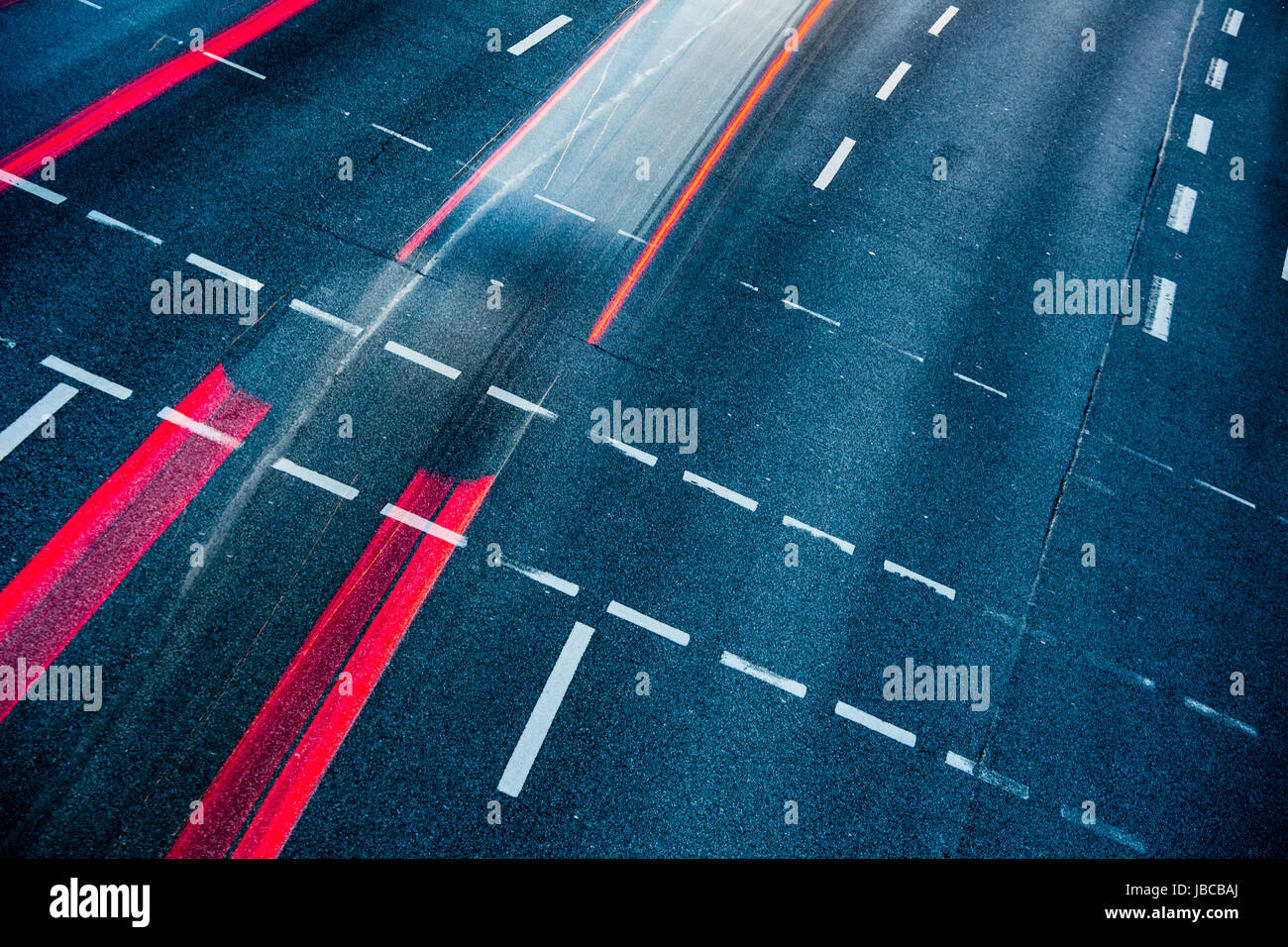 Motion blurred city road traffic (color toned image Stock Photo - Alamy