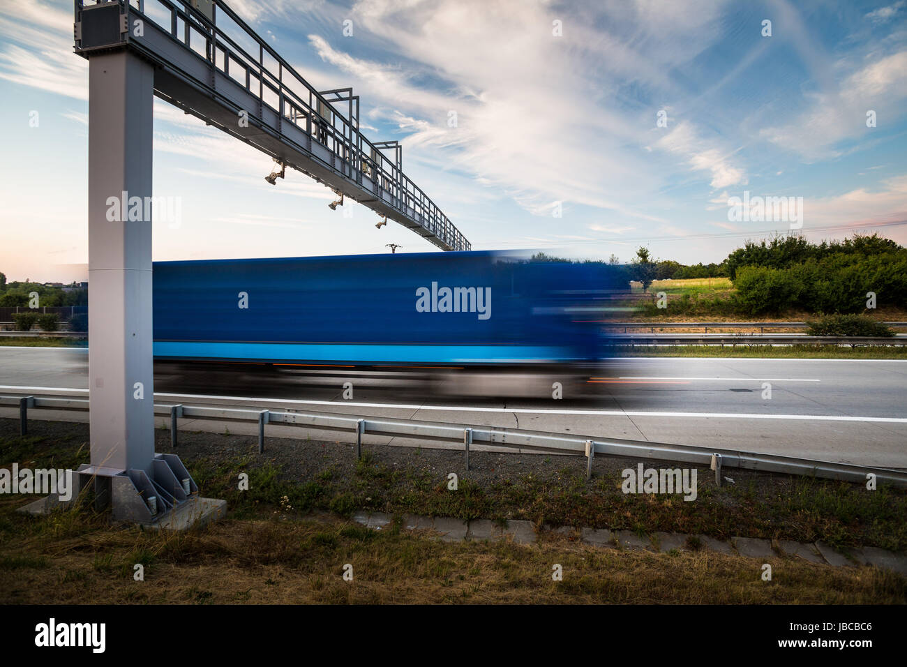 Truck passing through gate hi-res stock photography and images - Alamy