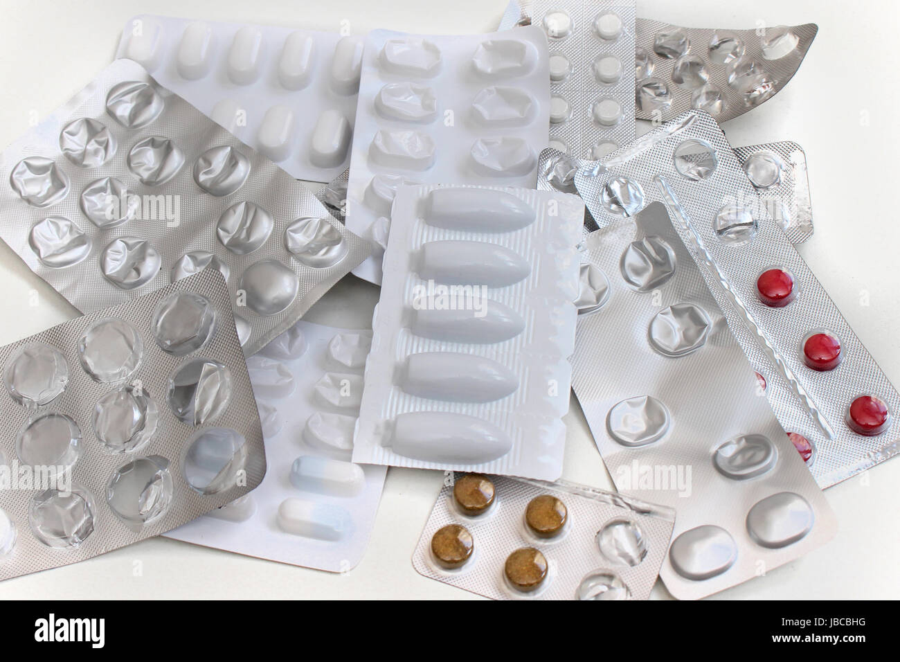 Large pile of half used prescription drugs blisters Stock Photo - Alamy