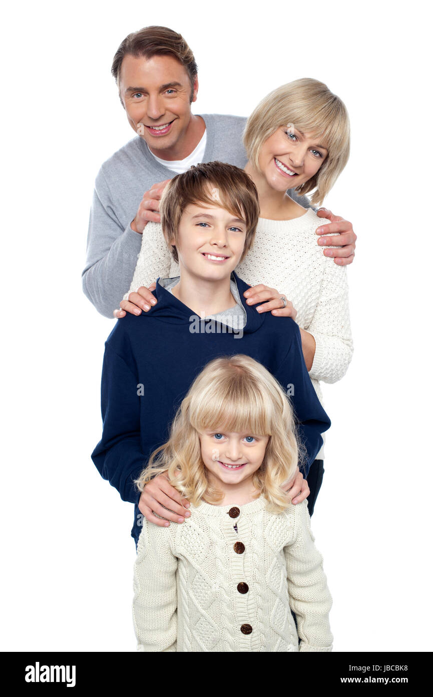 Family members standing behind one another Stock Photo - Alamy