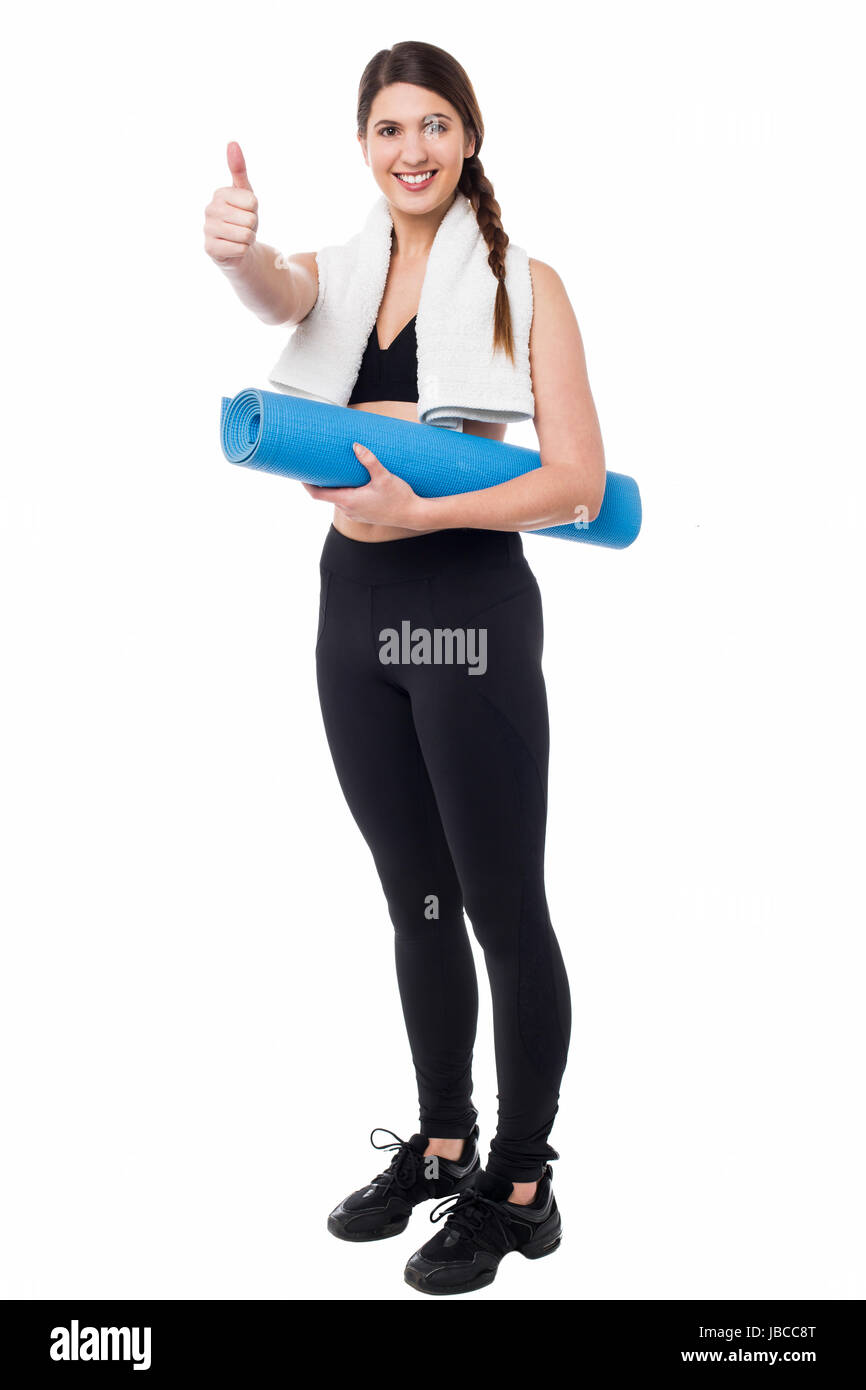 Fit lady with success gesture after her workout Stock Photo - Alamy