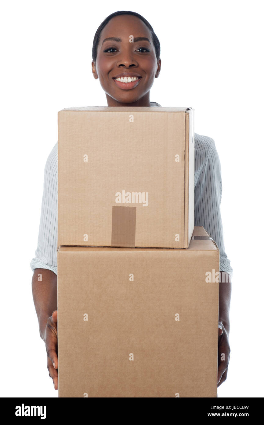 Business lady carrying packed cartons Stock Photo - Alamy