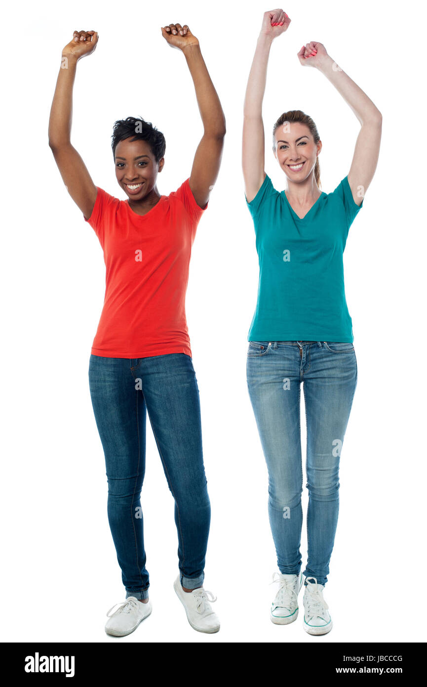 Women raising their arms up in excitement Stock Photo - Alamy
