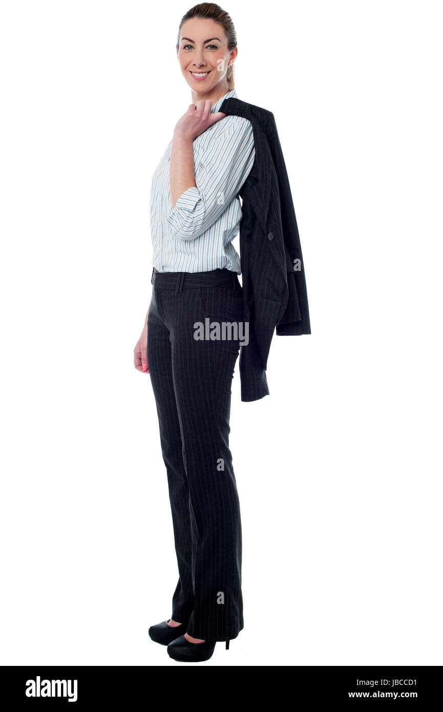 Corporate lady with coat slung over her shoulder Stock Photo - Alamy