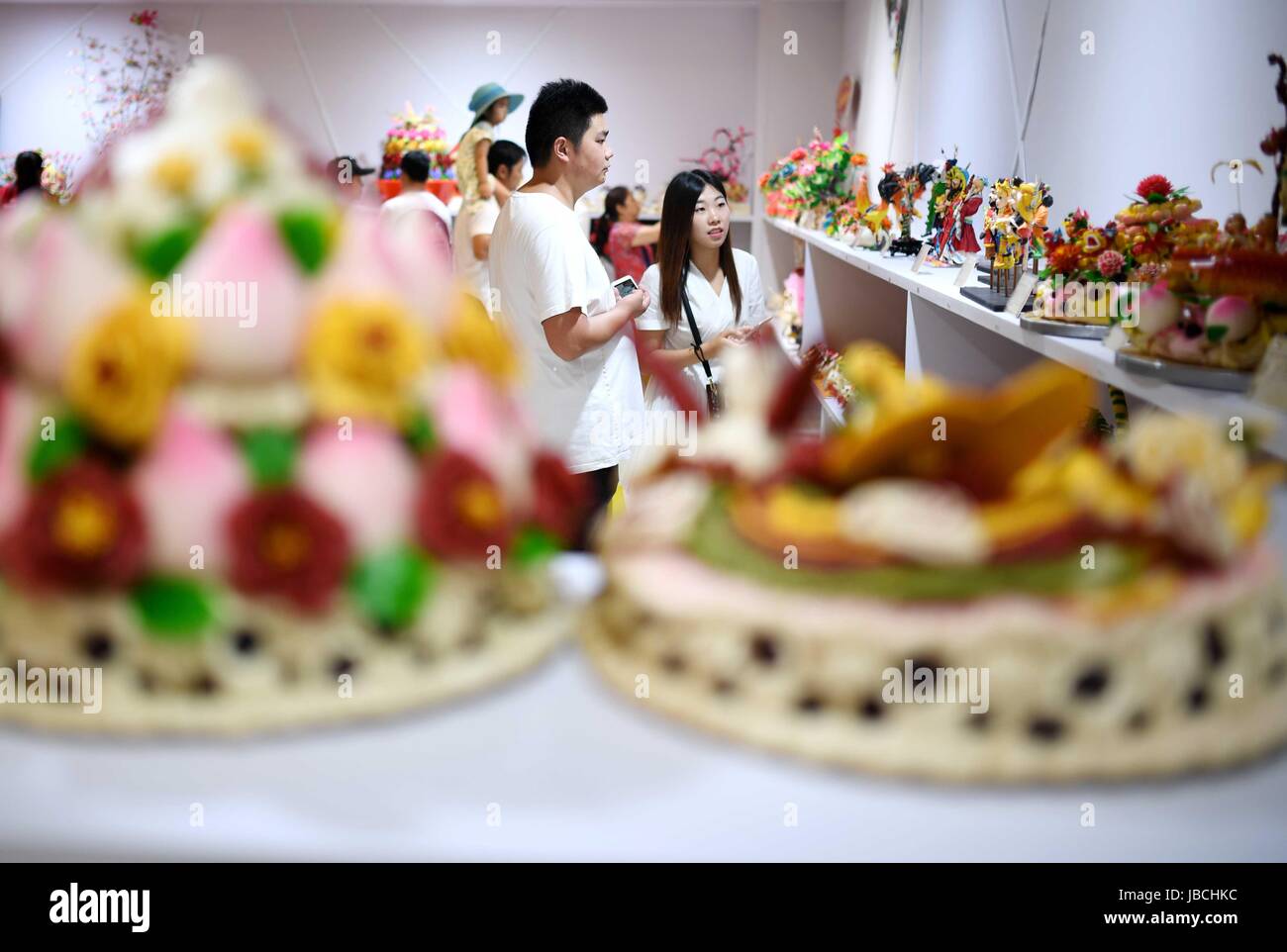 Chengdu, China's Sichuan Province. 10th June, 2017. Visitors watch ...
