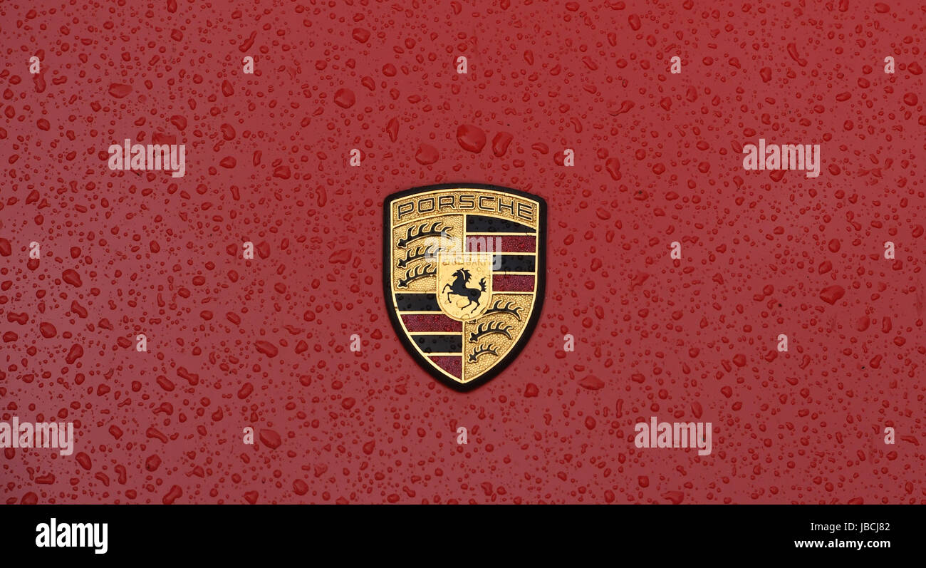 A Porsche Logo on the hood of a vehicle in Binz on the island of Ruegen ...