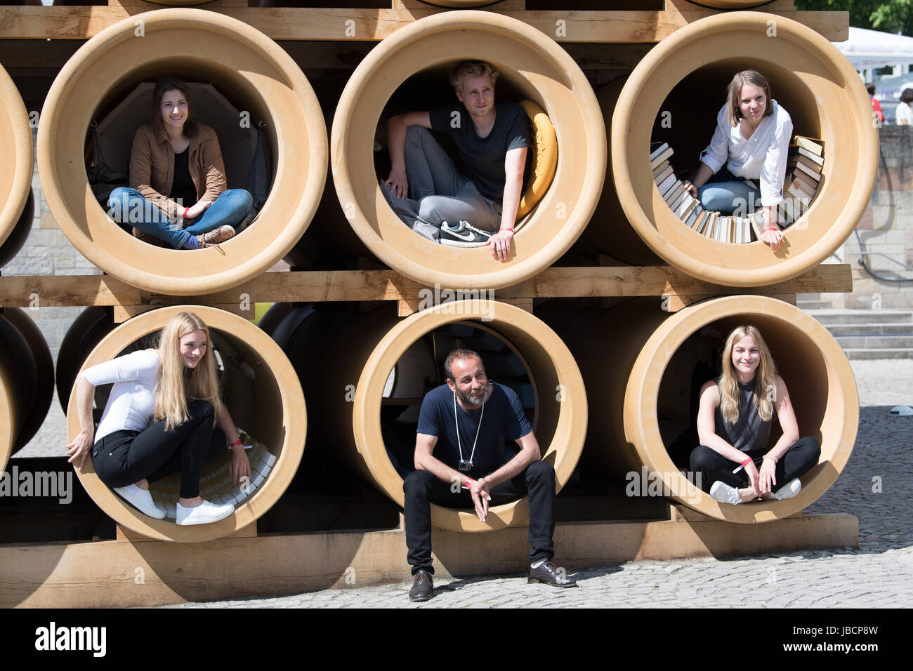 Kassel, Germany. 10th June, 2017. Installation artist Hiwa K. (bottom c ...