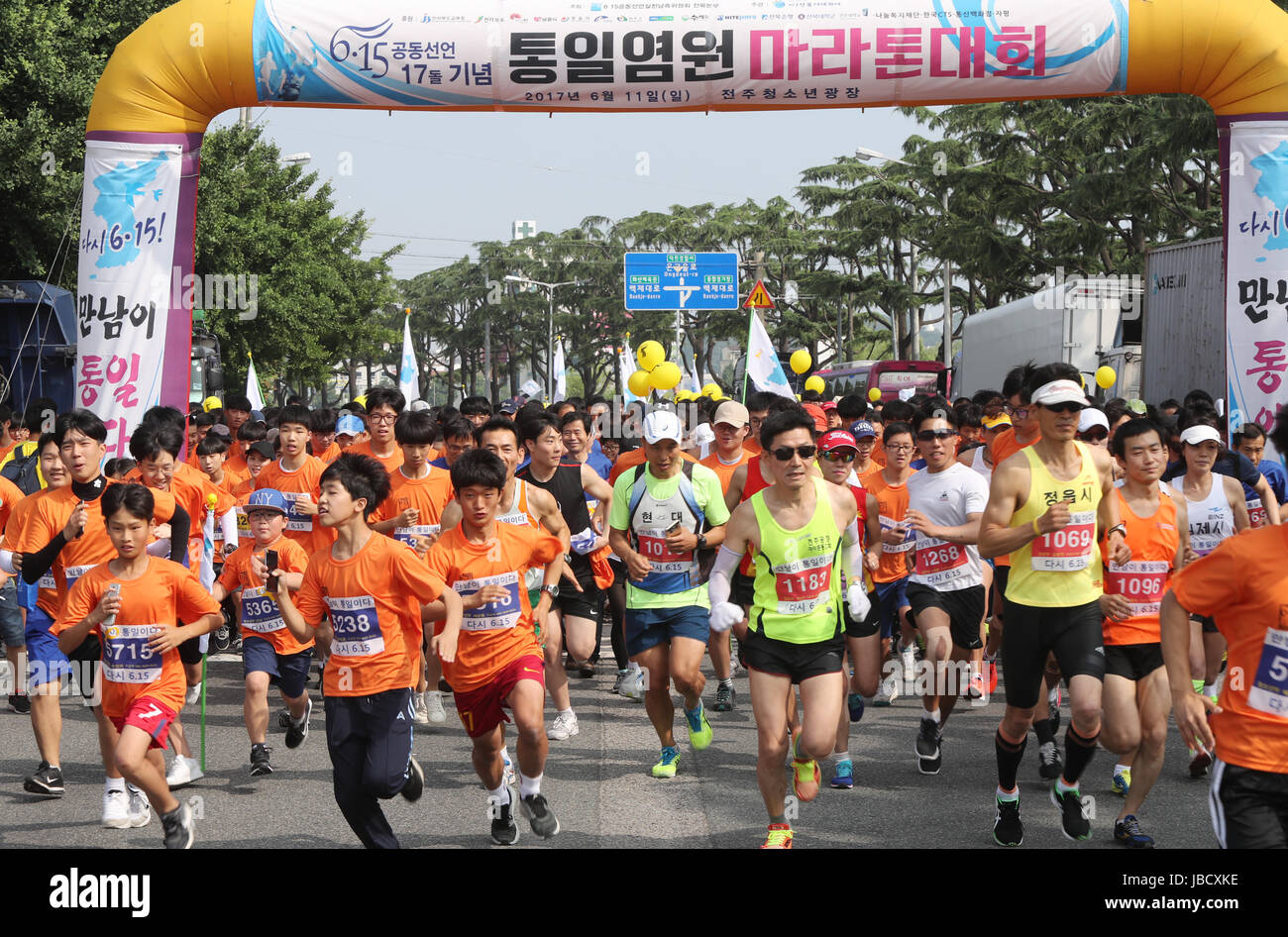 Marathon for unification Participants run during a marathon held in ...