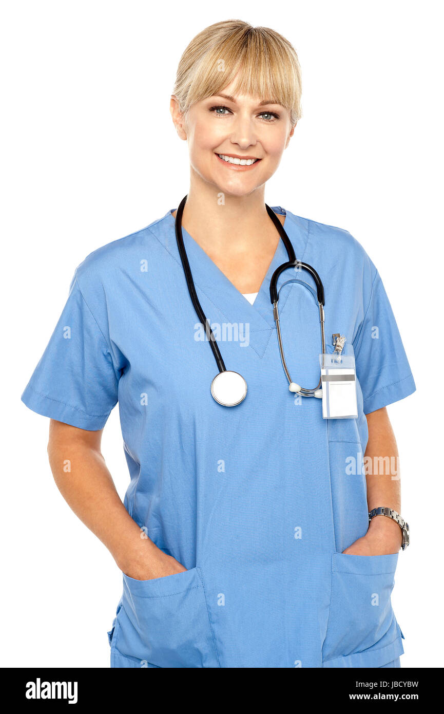 Pretty medical professional posing casually, stethoscope around her ...
