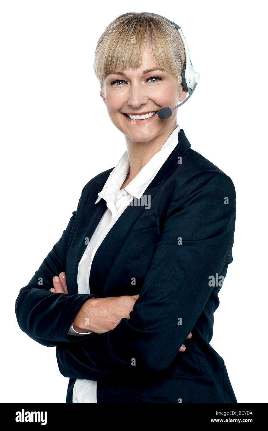 Cheerful female telecaller wearing headset and posing confidently with ...