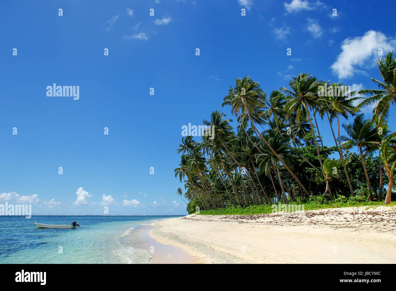 Sandy beach in Lavena village on Taveuni Island, Fiji. Taveuni is the ...