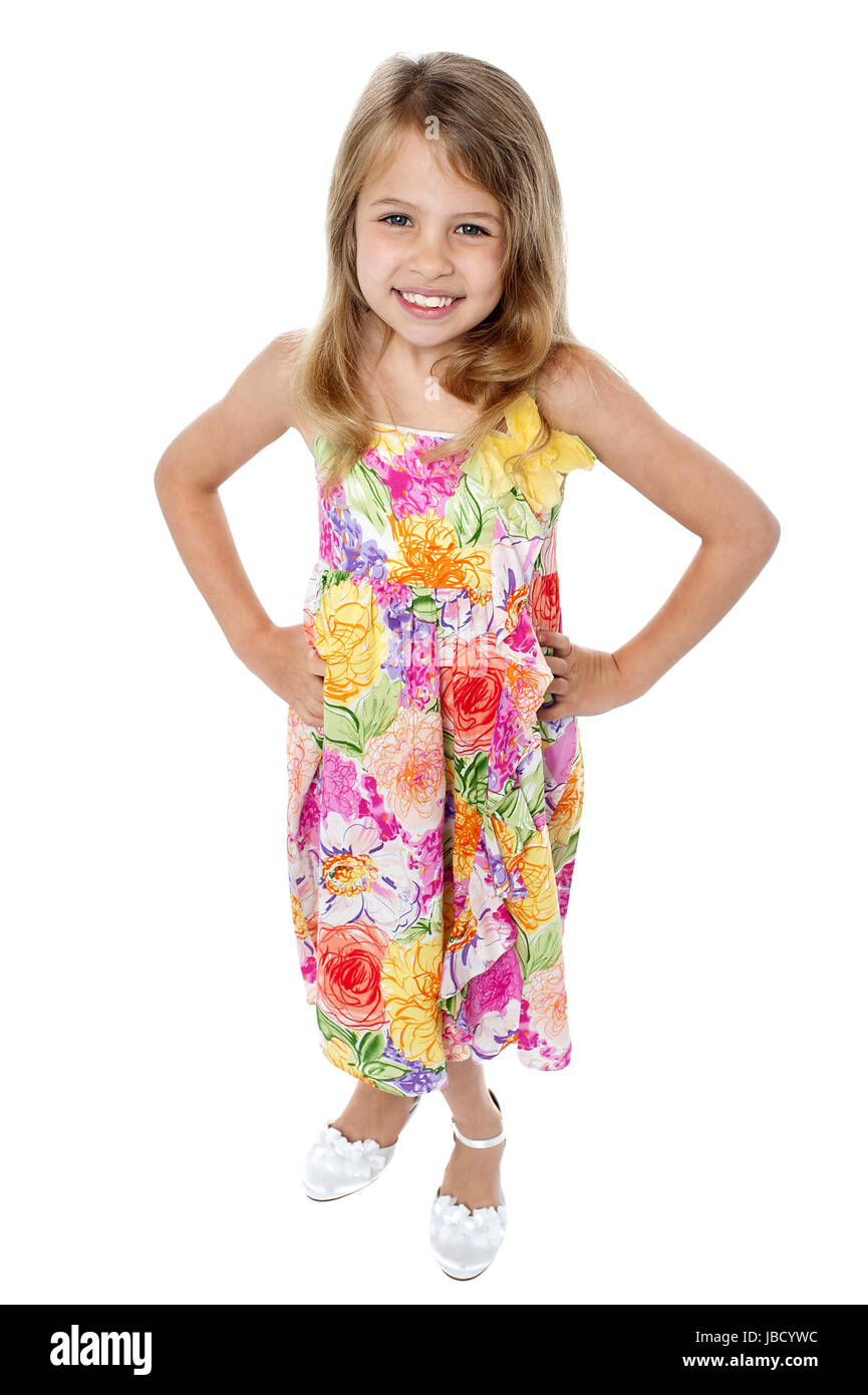 Adorable young kid posing for a portrait on white background, wearing ...