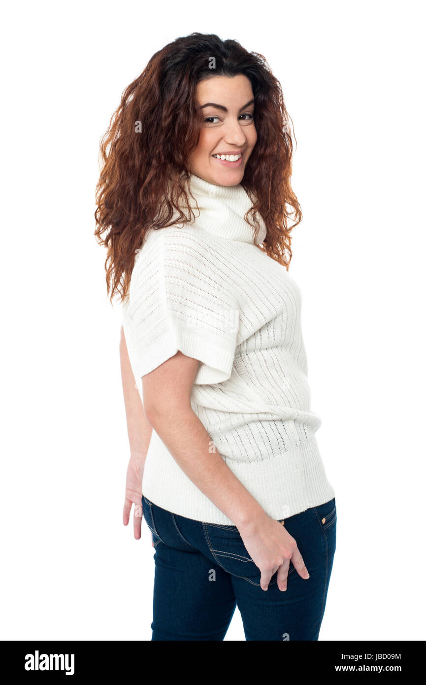 Gorgeous female turning back and smiling at you, white background Stock ...