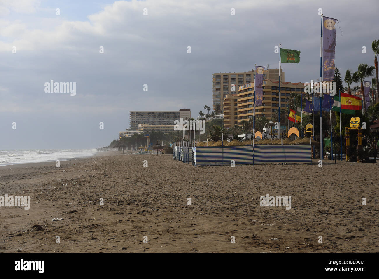 Stormy weather in February on the beach at Torremolinos, Malaga, Spain ...
