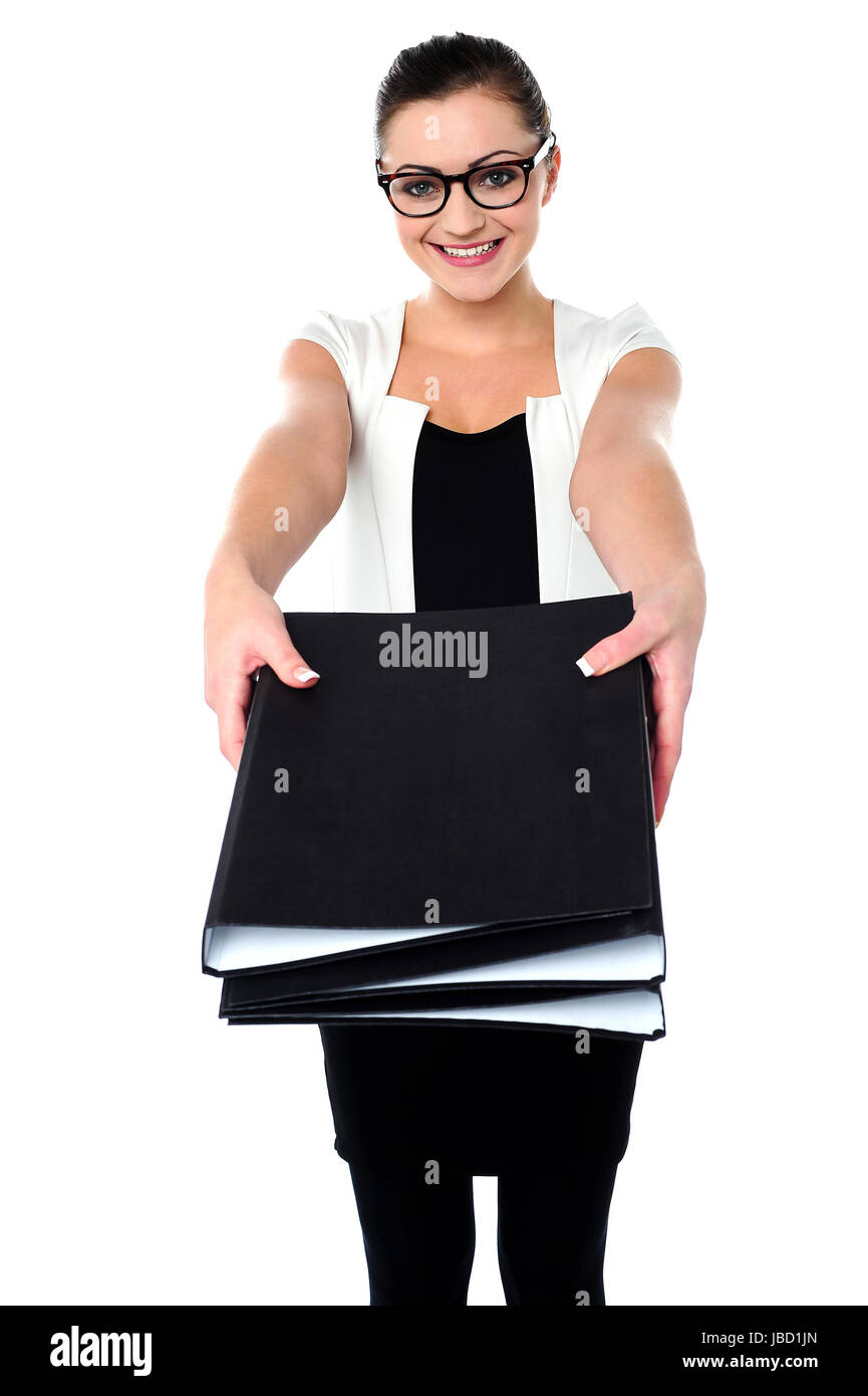 Cheerful secretary handing over the files to her boss Stock Photo - Alamy