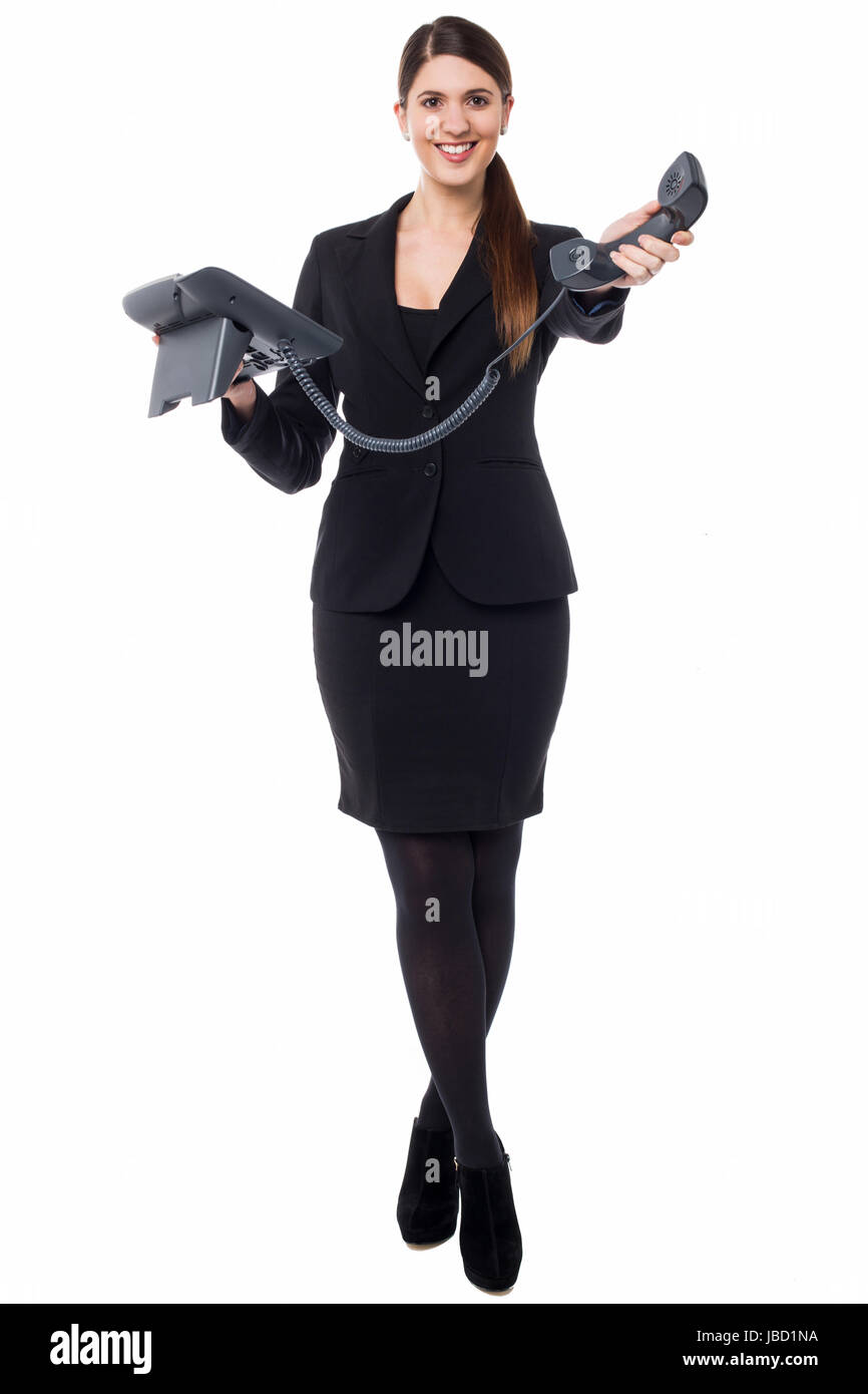 Female secretary handing over phone receiver to boss Stock Photo - Alamy