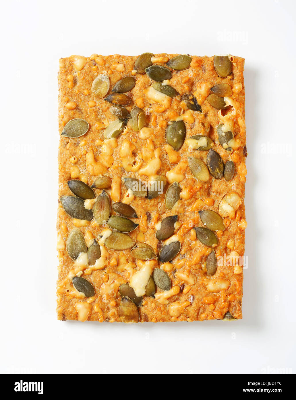 Whole grain cracker with cheddar and pepitas Stock Photo - Alamy