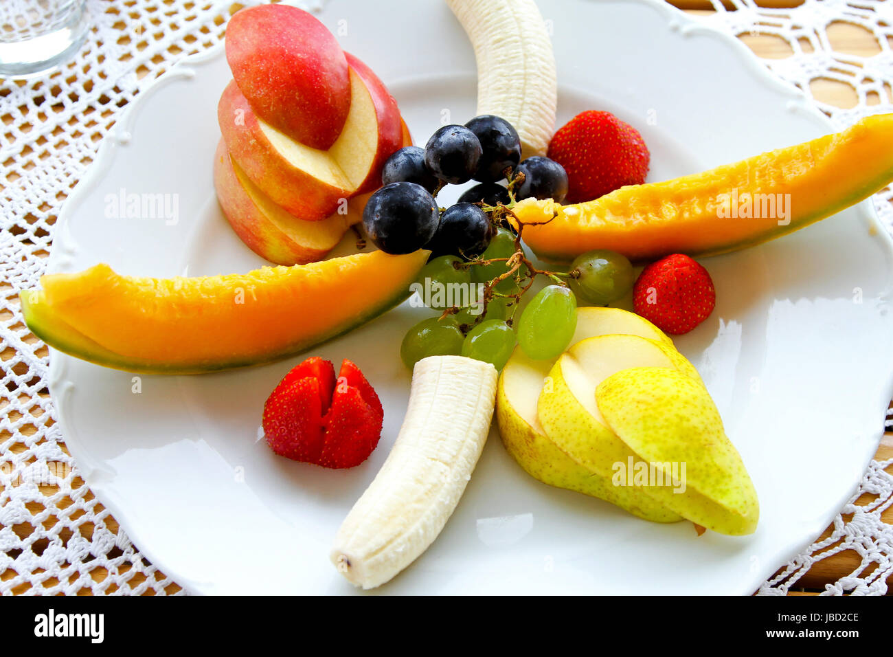 Fresh and colorful fruits assortment served at plate Stock Photo - Alamy