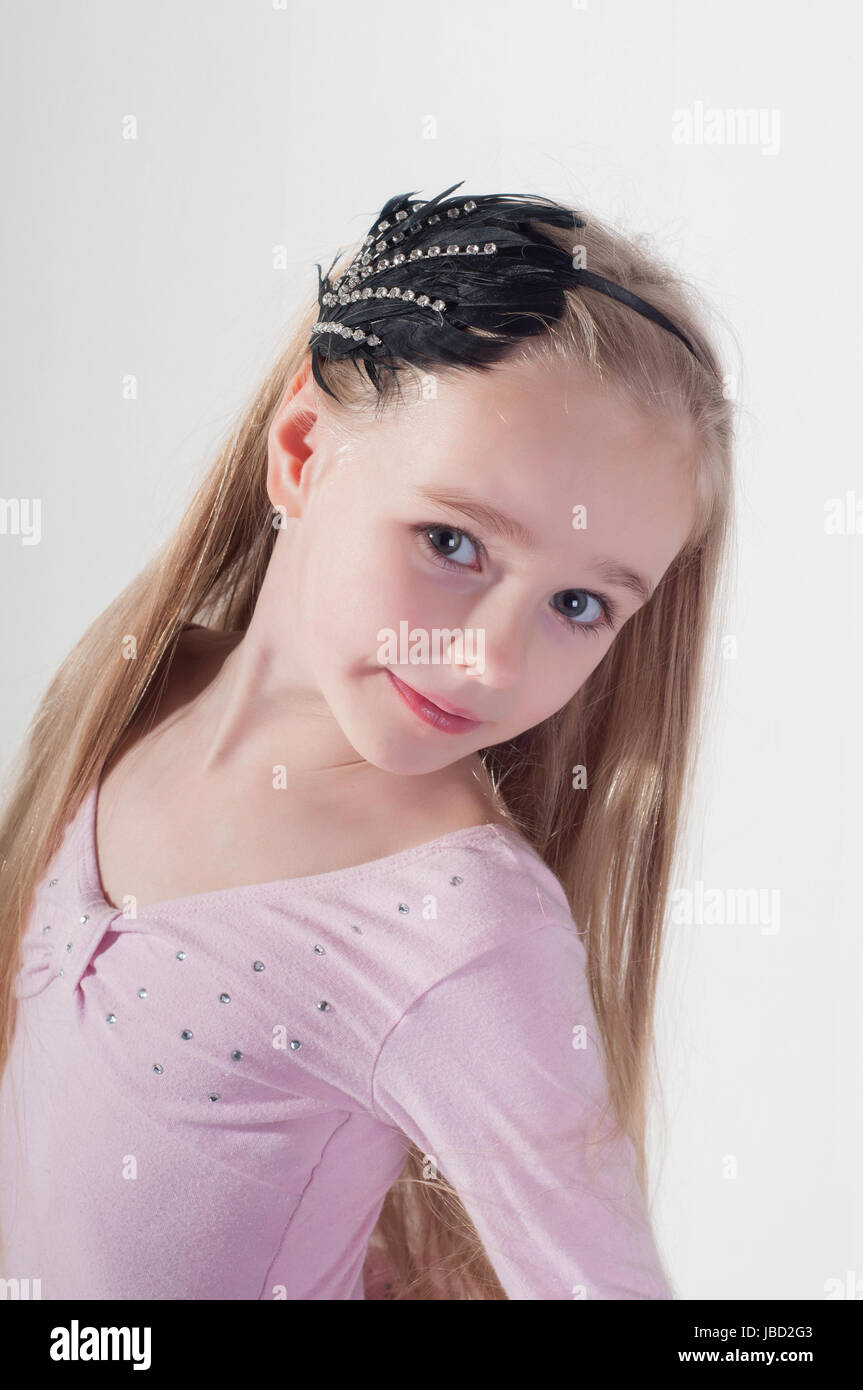 Portrait in blond girl with long hair in studio Stock Photo - Alamy