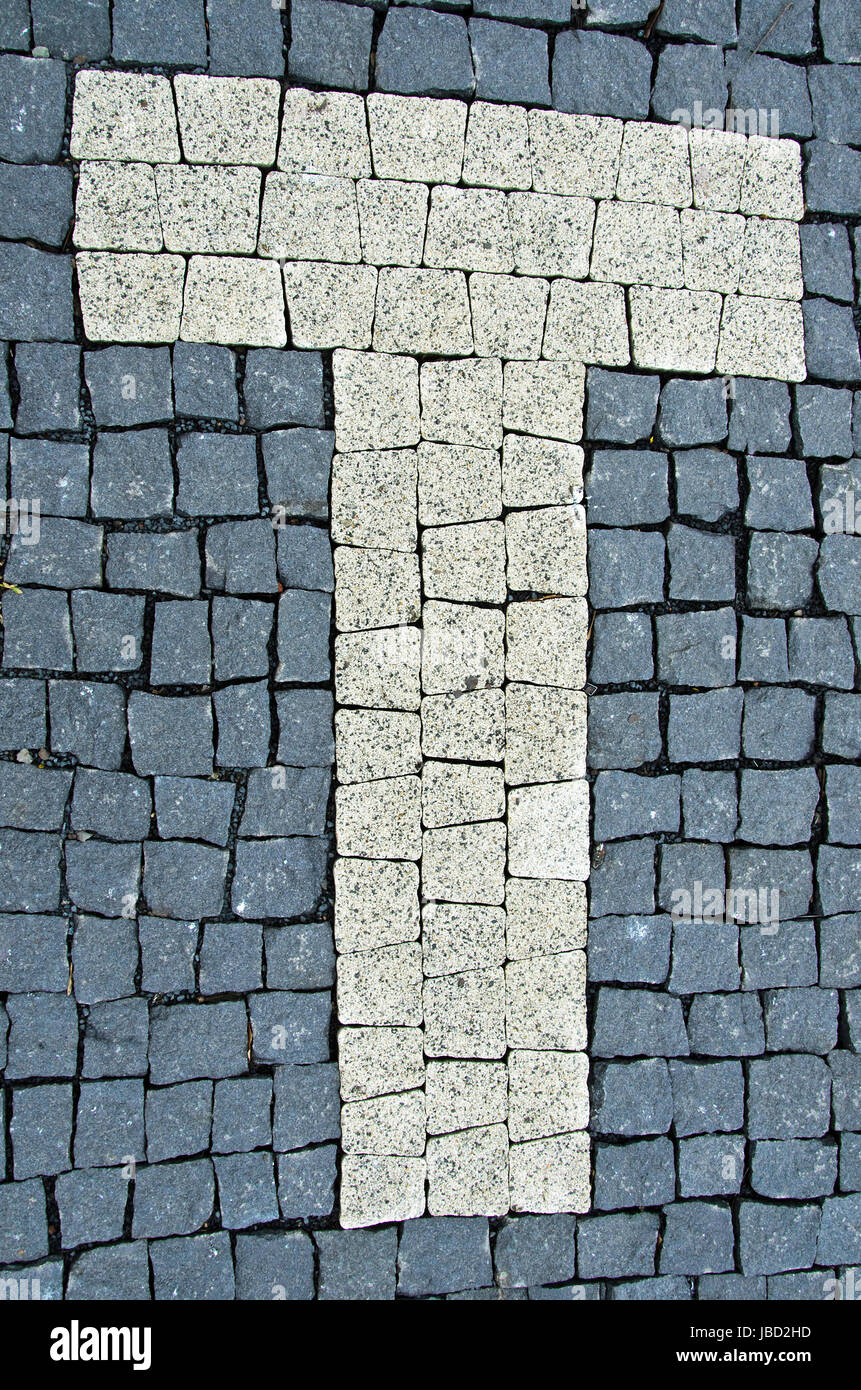 Photo of sidewalk made of stones with letters Stock Photo - Alamy