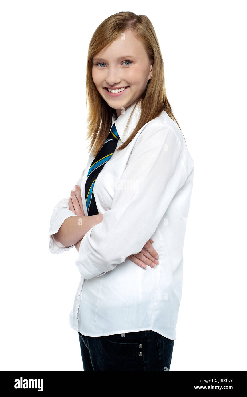 Trendy student posing with arms crossed Stock Photo - Alamy