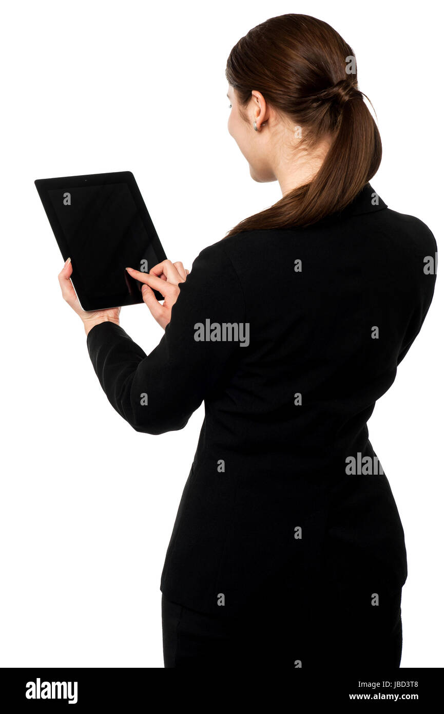 Corporate lady browsing on her tablet pc Stock Photo - Alamy