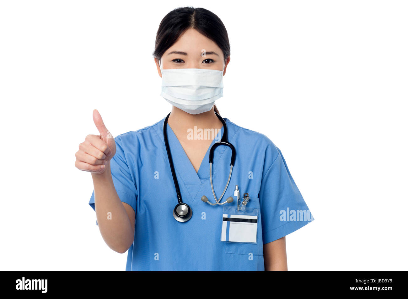 Doctor showing thumbs up after doing successful surgery Stock Photo - Alamy