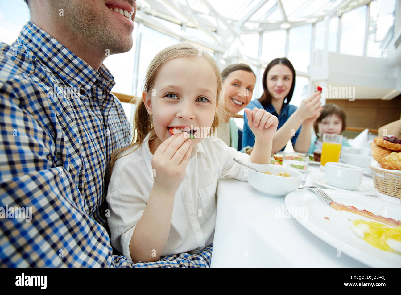 Child eating breakfast hi-res stock photography and images - Alamy